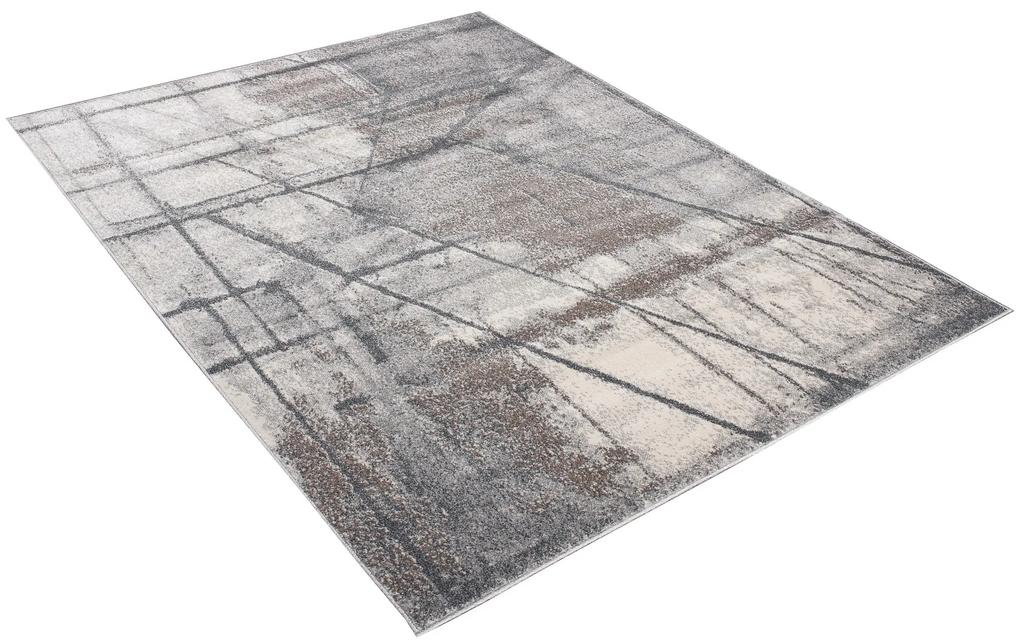 Béžovo šedý designový koberec s abstraktním vzorem