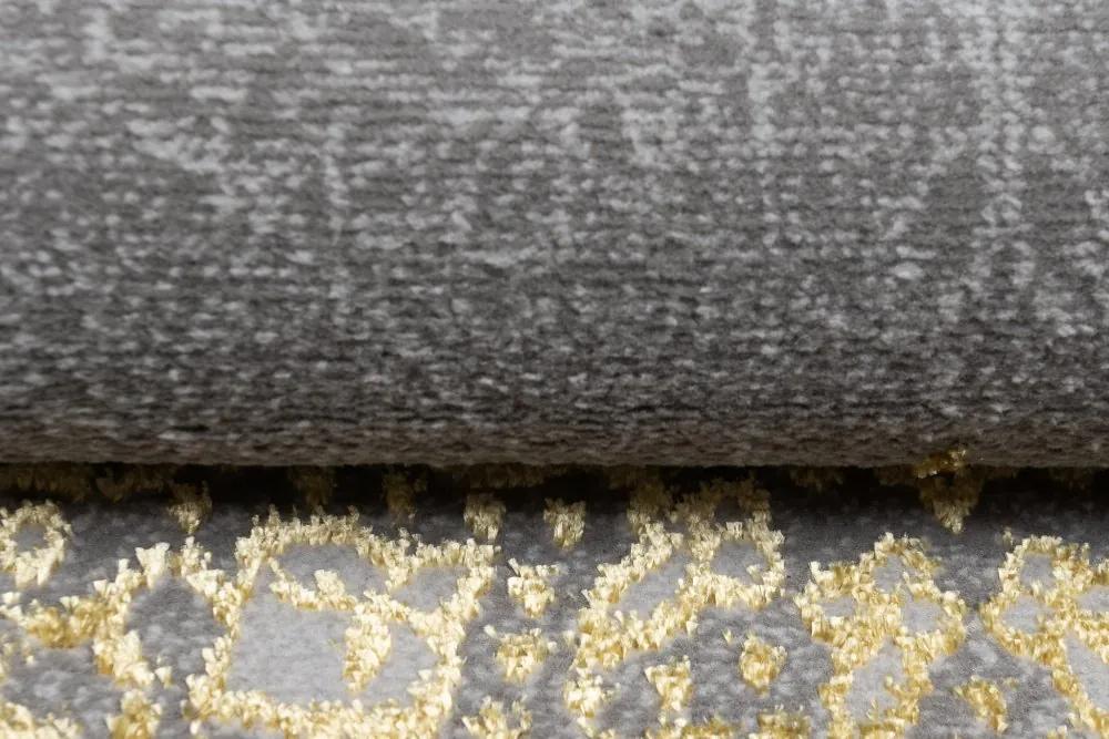 Exkluzivní šedý koberec se zlatým orientálním vzorem Šířka: 140 cm | Délka: 200 cm