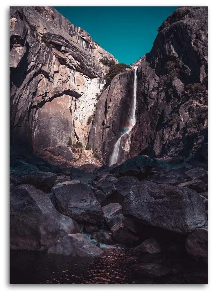 Gario Obraz na plátně Vodopád mezi vysokými skalami Rozměry: 40 x 60 cm