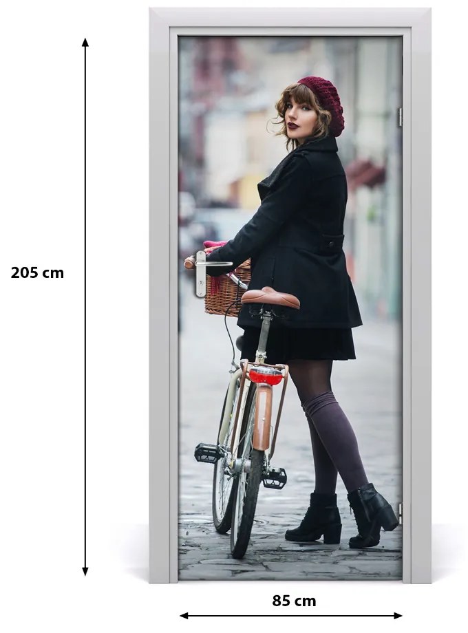 Fototapeta samolepící dveře žena na kole 85x205 cm