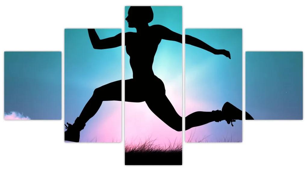 Obraz skákající siluety ženy (125x70 cm)