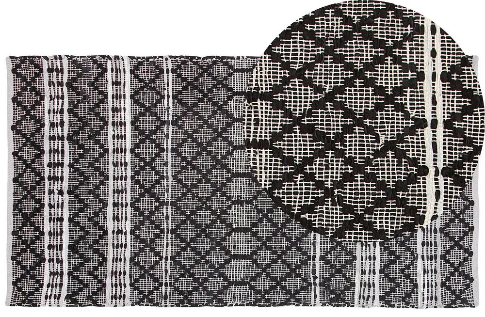Kožený koberec 80 x 150 cm černý s béžovým FEHIMLI Beliani