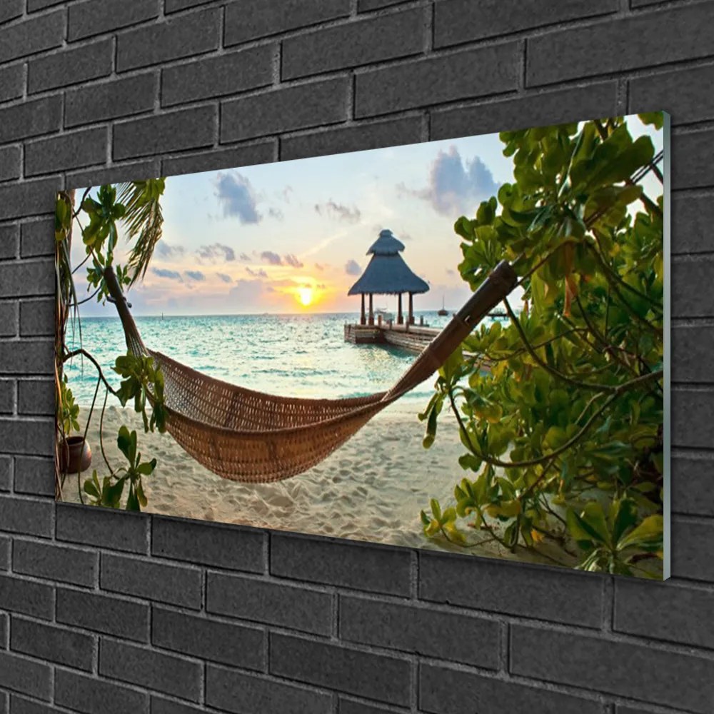 Obraz na skle Pláž Hamaka Moře Krajina 120x60 cm