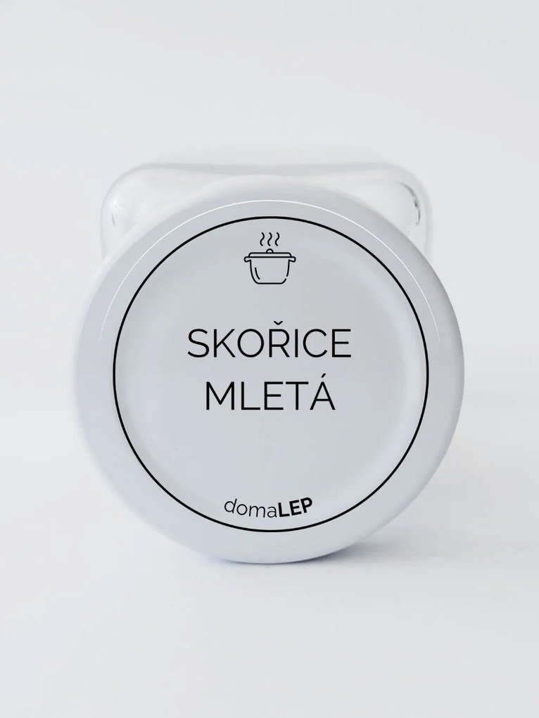 Samolepka na kořenky SKOŘÍCE MLETÁ průhledná 5 cm základní písmo