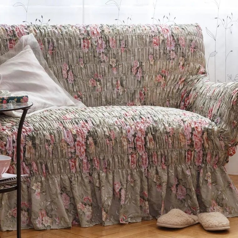 Napínací potahy s volánem FIORELA zelená křeslo (š. 60 - 110 cm)