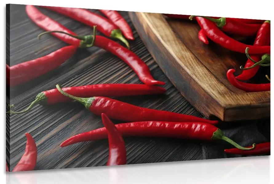 Obraz deska s chili papričkami