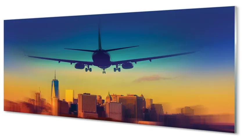 akrylový obraz Velkoměsto oblačnosti letadlo západ 120x60 cm