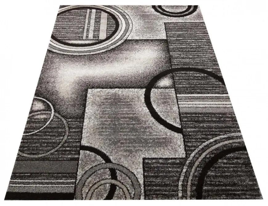 Moderní koberec s motivem kruhů šedé barvy Šířka: 120 cm | Délka: 170 cm