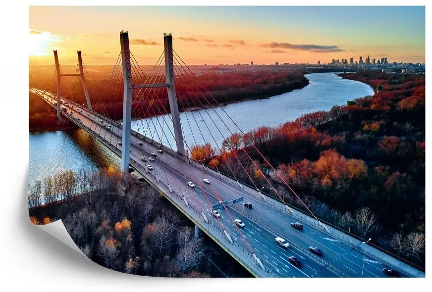 Fototapeta Beautiful Panoramic Aerial Drone View To Cable-Stayed Siekierkowski Bridge Over The Vistula River And Warsaw City Skyscrapers, Poland In Gold Red Autumn Colors In November Evening At Sunset Hladký vinyl 520x318