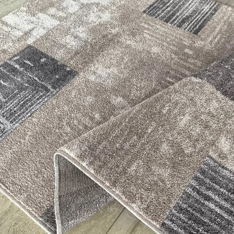 DY Hnědý koberec s geometrickým vzorem Panamero 24 Rozměr: 60x100 cm