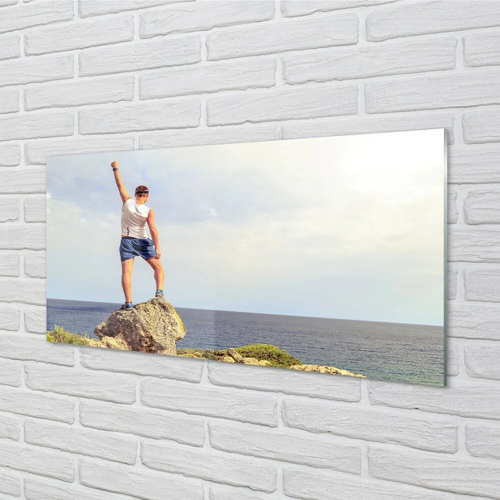 Obraz na skle Muž mořská oblohy 125x50 cm