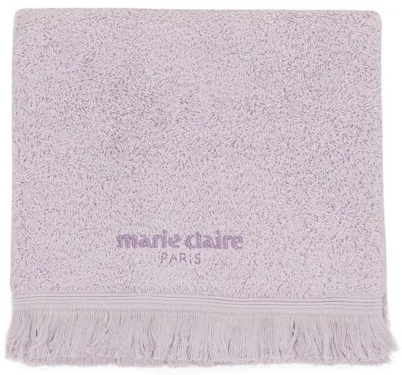 Fialový ručník na ruce Marie Claire
