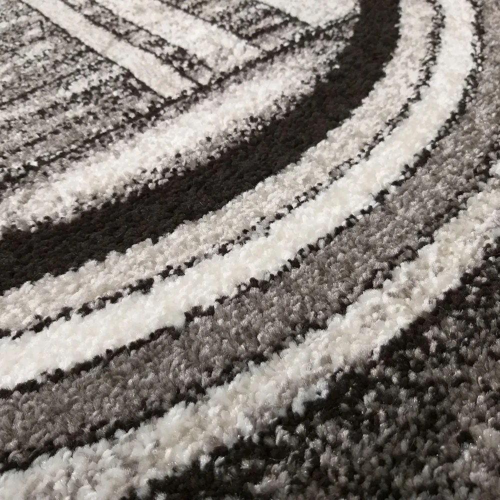 Moderní koberec s motivem kruhů šedé barvy Šířka: 80 cm | Délka: 150 cm