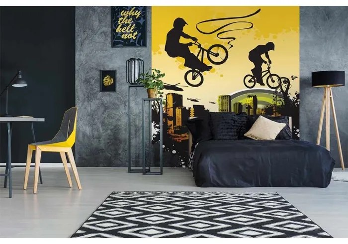 DIMEX | Vliesová fototapeta na zeď Cyklisti MS-3-0326 | 225 x 250 cm | žlutá, černá, oranžová