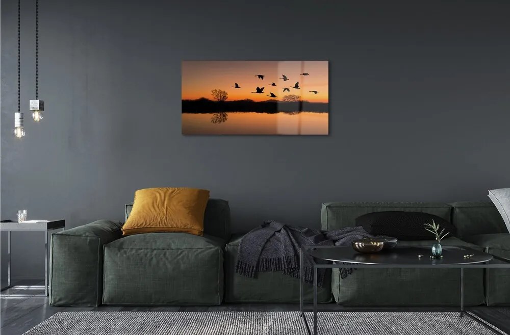 Obraz na skle Létající ptáky sunset 140x70 cm