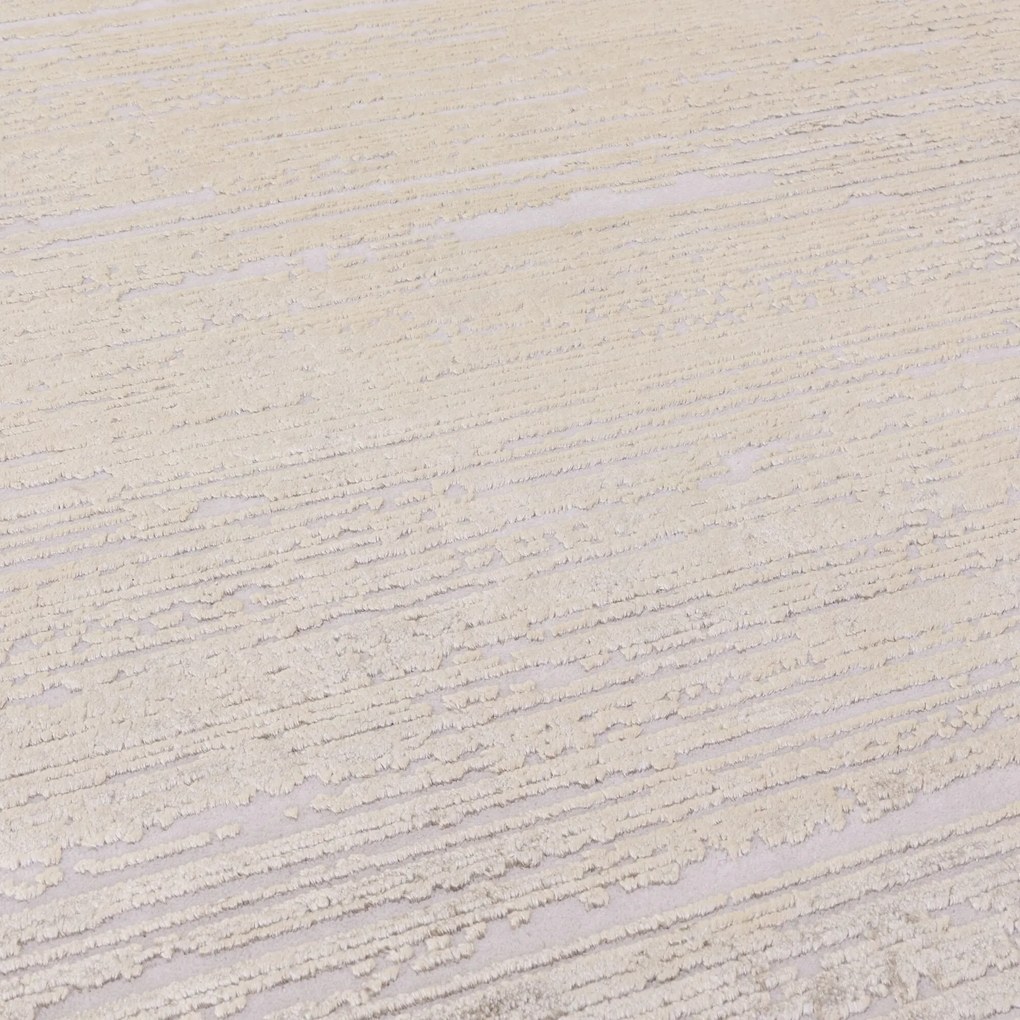 Tribeca Design Kusový koberec Trigger Champagne Gold Rozměry: 120x170 cm