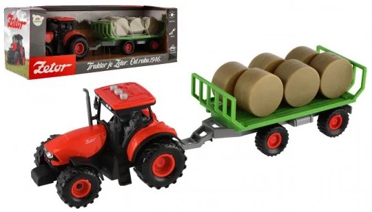 Traktor Zetor s vlekem a balíky plast 36cm na setrvačník na bat. se světlem se zvukem v krab. 39x13