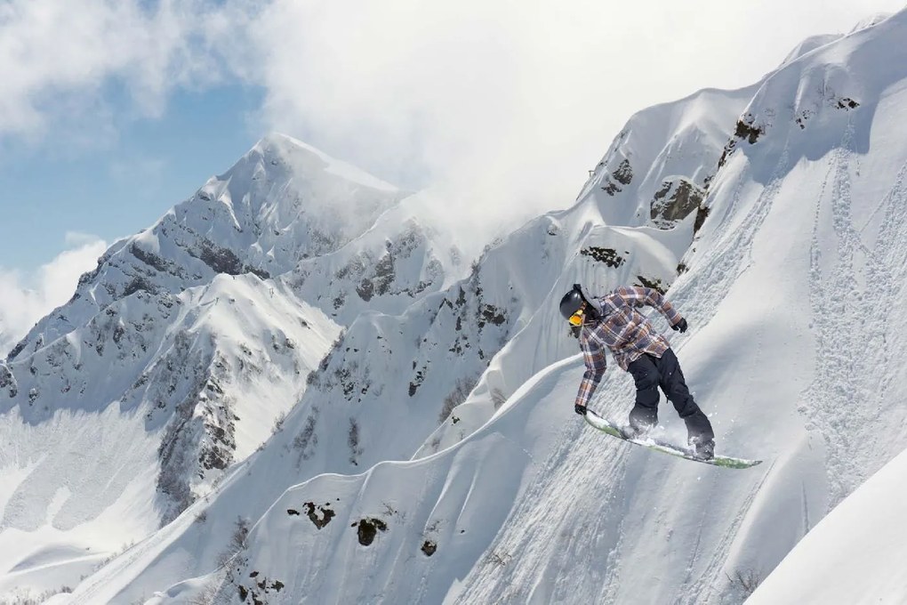 DIMEX | Samolepicí vliesová fototapeta na zeď Snowboardista na horách MA-5-1571 | 375 x 250 cm | modrá, bílá