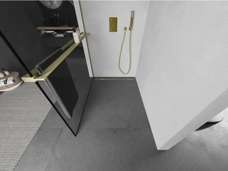 Mexen Kioto+, sprchová zástěna Walk-In s poličkou a věšákem 70 x 200 cm, 8mm čiré sklo černý vzor, ​​zlatý matný profil, 800-070-121-55-70