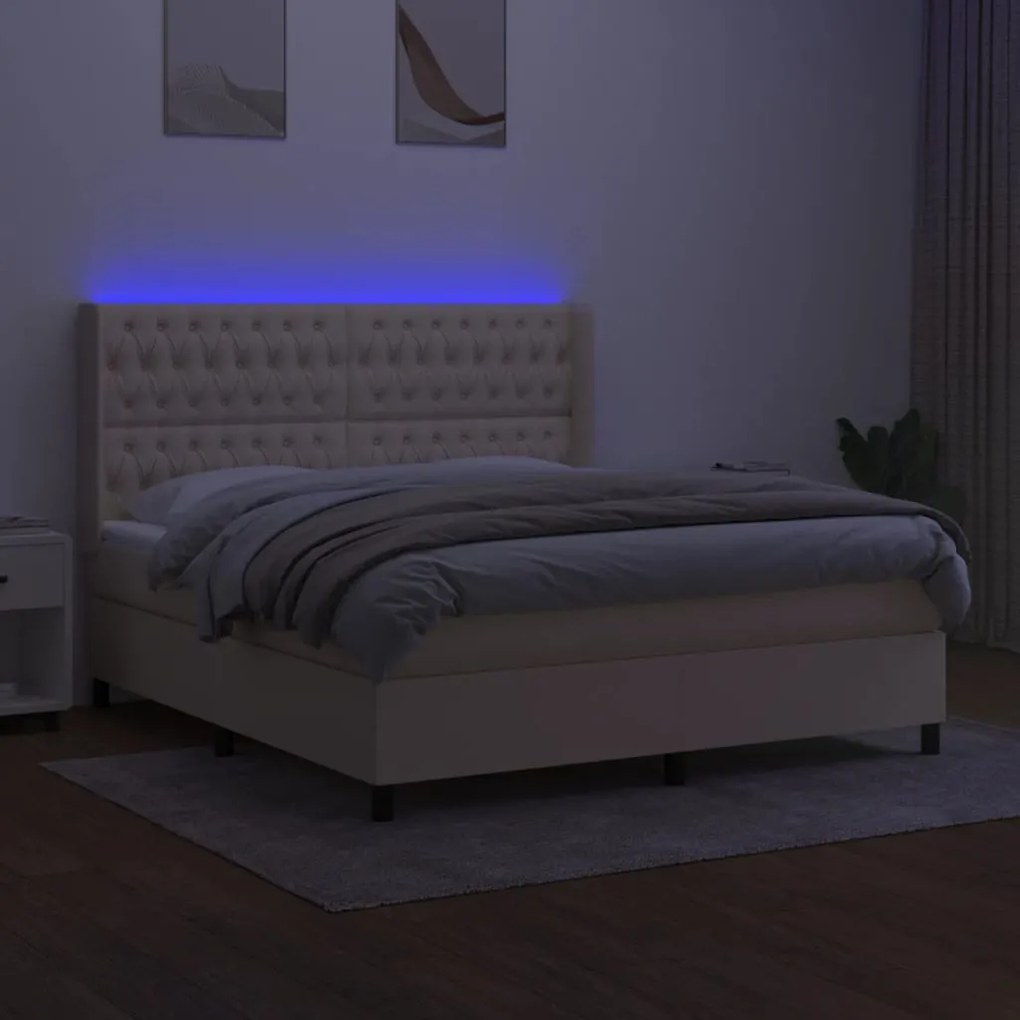 Box spring postel s matrací a LED krémová 180x200 cm textil 3138578