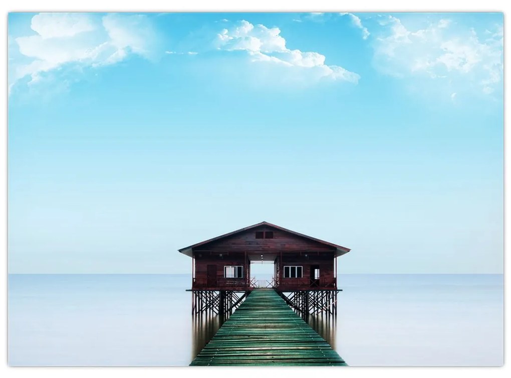 Skleněný obraz domu na moři (70x50 cm)