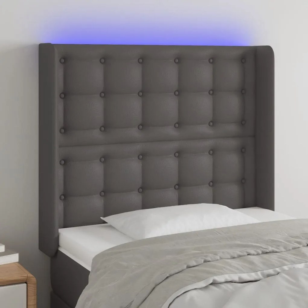 Čelo postele s LED šedé 83 x 16 x 118/128 cm umělá kůže