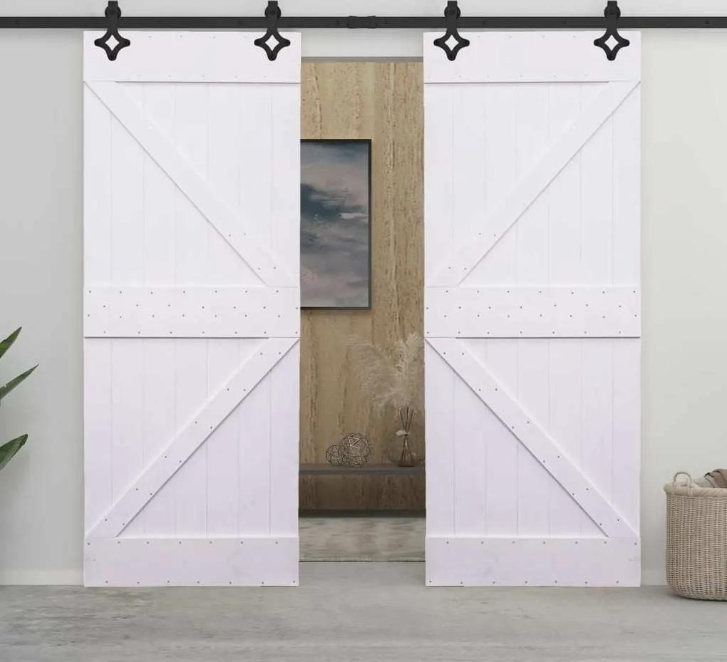 vidaXL Posuvné dveře s kováním 100 x 210 cm masivní borovice [3057597] Barva: Hnědá
