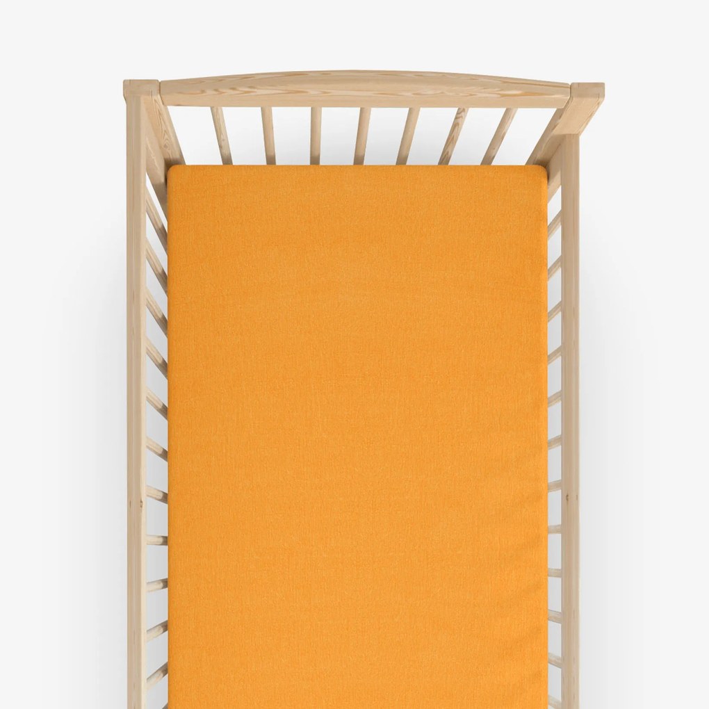 Goldea prostěradlo jersey do dětské postýlky - oranžové 60 x 120 cm