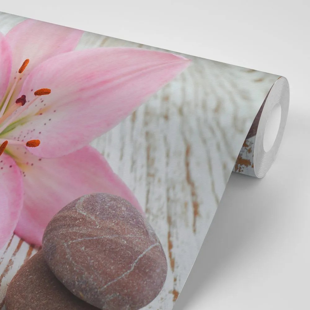 Fototapeta růžová lilie a Zen kameny