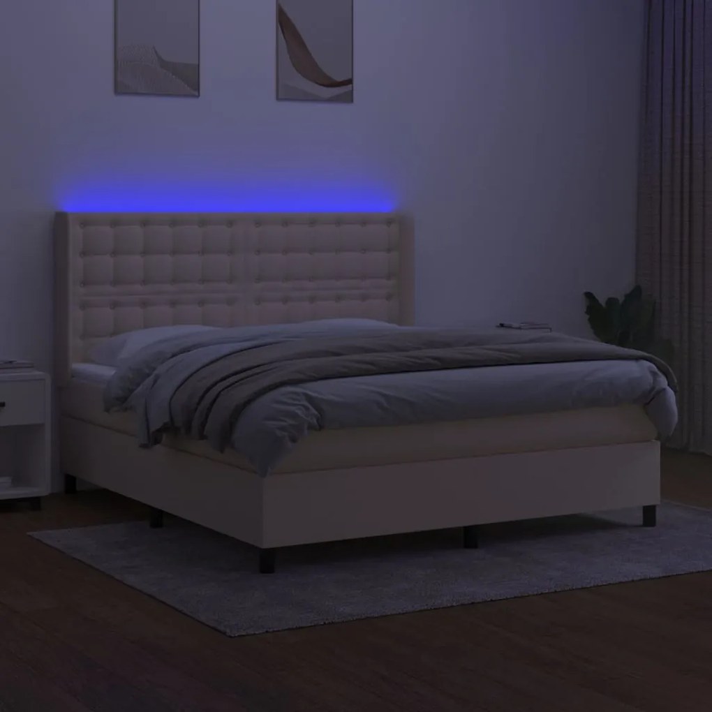 Box spring postel s matrací a LED krémová 180x200 cm textil 3138658