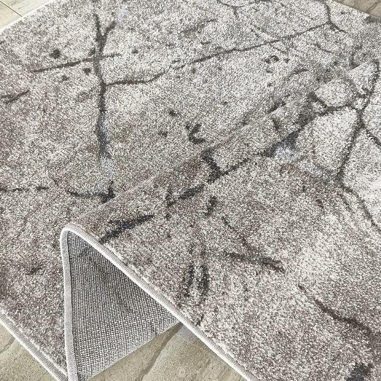 DY Béžový koberec s mramorovým vzorem Panamero 25 Rozměr: 60x100 cm