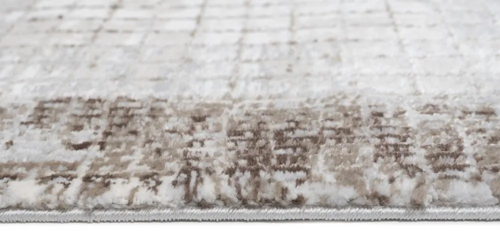 Designový vintage koberec s geometrickými vzory v hnědých odstínech Šířka: 120 cm | Délka: 170 cm