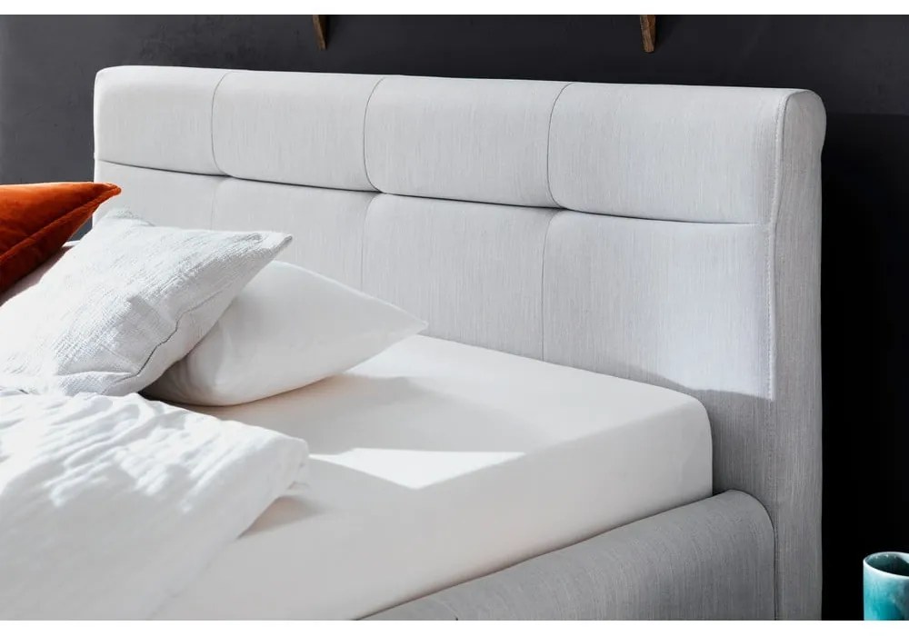Světle šedá čalouněná dvoulůžková postel s úložným prostorem s roštem 140x200 cm Lotte - Meise Möbel