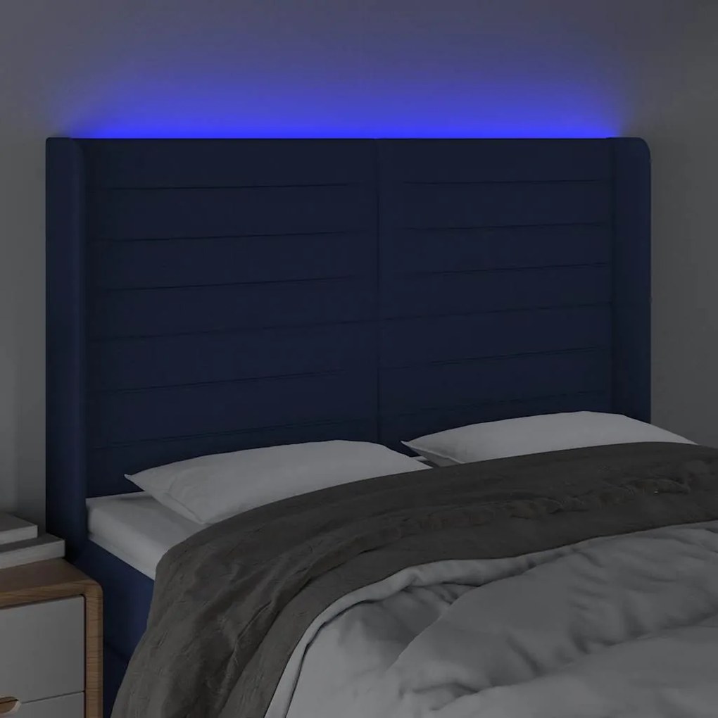 Čelo postele s LED modré 147 x 16 x 118/128 cm textil 3124192