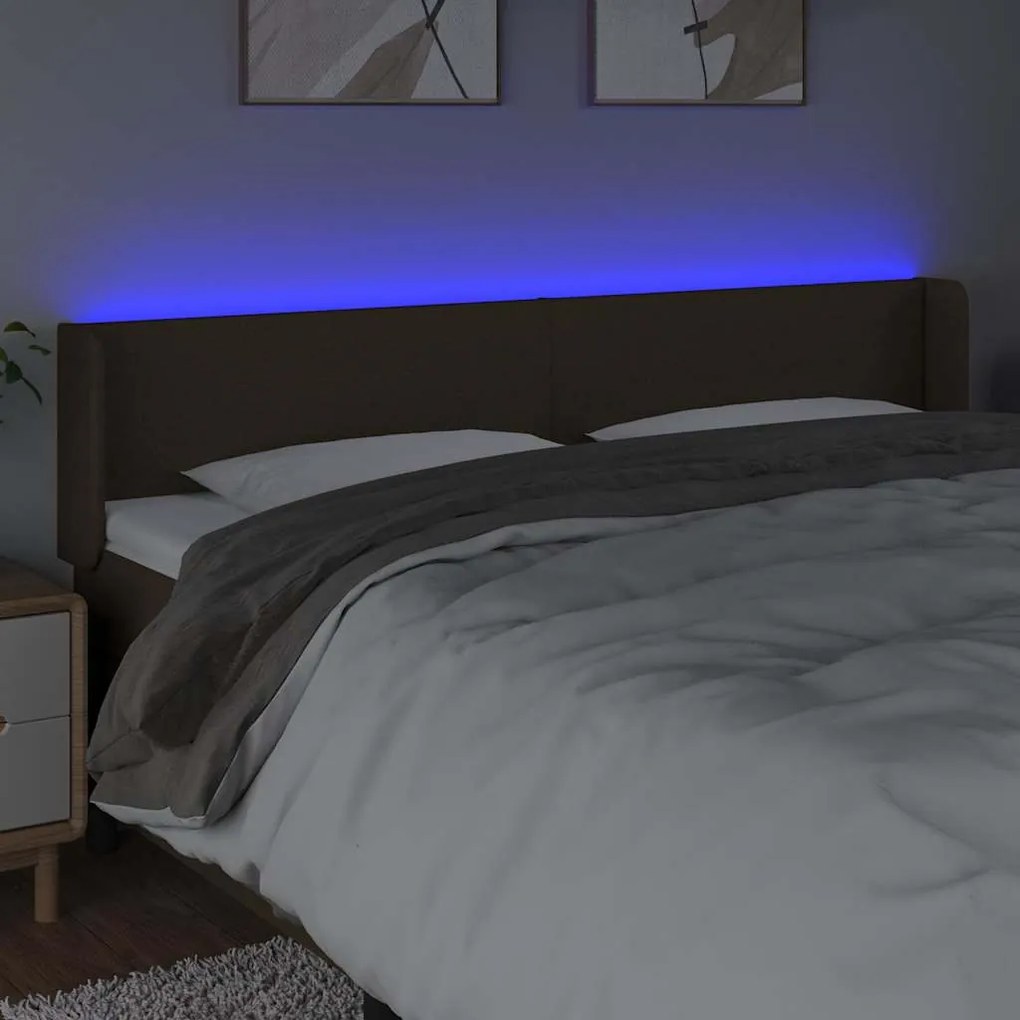 Čelo postele s LED tmavě hnědé 183 x 16 x 78/88 cm textil 3122973