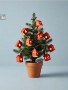 Sinsay - Vánoční LED světelný řetěz s motivem domečků - červená