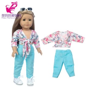 Svatební oblek a jiné oblečení pro panenku AMERICAN GIRL A BABY BORN 43-45 CM Varianta: květinové triko na zavazování a modré kalhoty