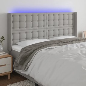 Čelo postele s LED světle šedé 203x16x118/128 cm textil 3124504