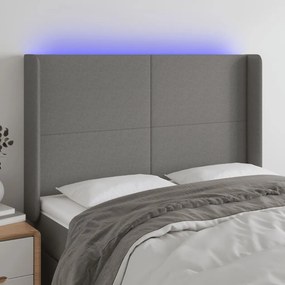 Čelo postele s LED tmavě šedé 147 x 16 x 118/128 cm textil 3123767