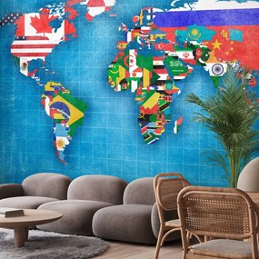 Fototapeta Mapa světa - motiv kontinentů v barvách vlajek na modrém pozadí