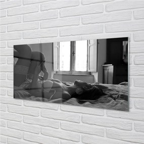 Skleněný panel Ležící žena na průzoru 140x70 cm