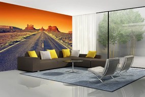 DIMEX | Samolepicí vliesová fototapeta na zeď Cesta do údolí Monument MA-5-2855 | 375 x 250 cm | zelená, oranžová, šedá