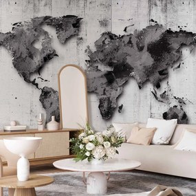 Fototapeta Svět v odstínech šedi - mapa světa na retro dřevěném pozadí