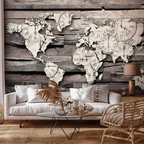 Fototapeta Uplynulý čas Země - mapa světa s motivem hodin na šedém dřevě