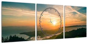 Obraz východu slunce nad mořem (s hodinami) (90x30 cm)
