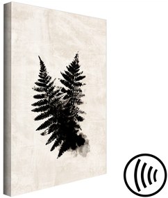 Obraz Černá kapradina - dva listy kapradí v černé barvě na světle potřeném pozadí