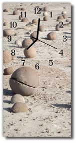 Skleněné hodiny vertikální Zobrazit kameny na béžové pláži