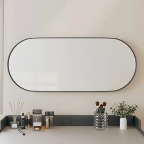 vidaXL Nástěnné zrcadlo černé 25x60 cm oválné