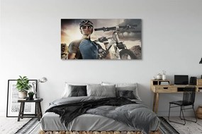 akrylový obraz Cyklista na kole mraky 140x70 cm