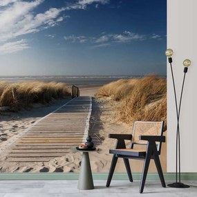 Fototapeta Langeoog - písečná pláž Severního moře pod modrou oblohou